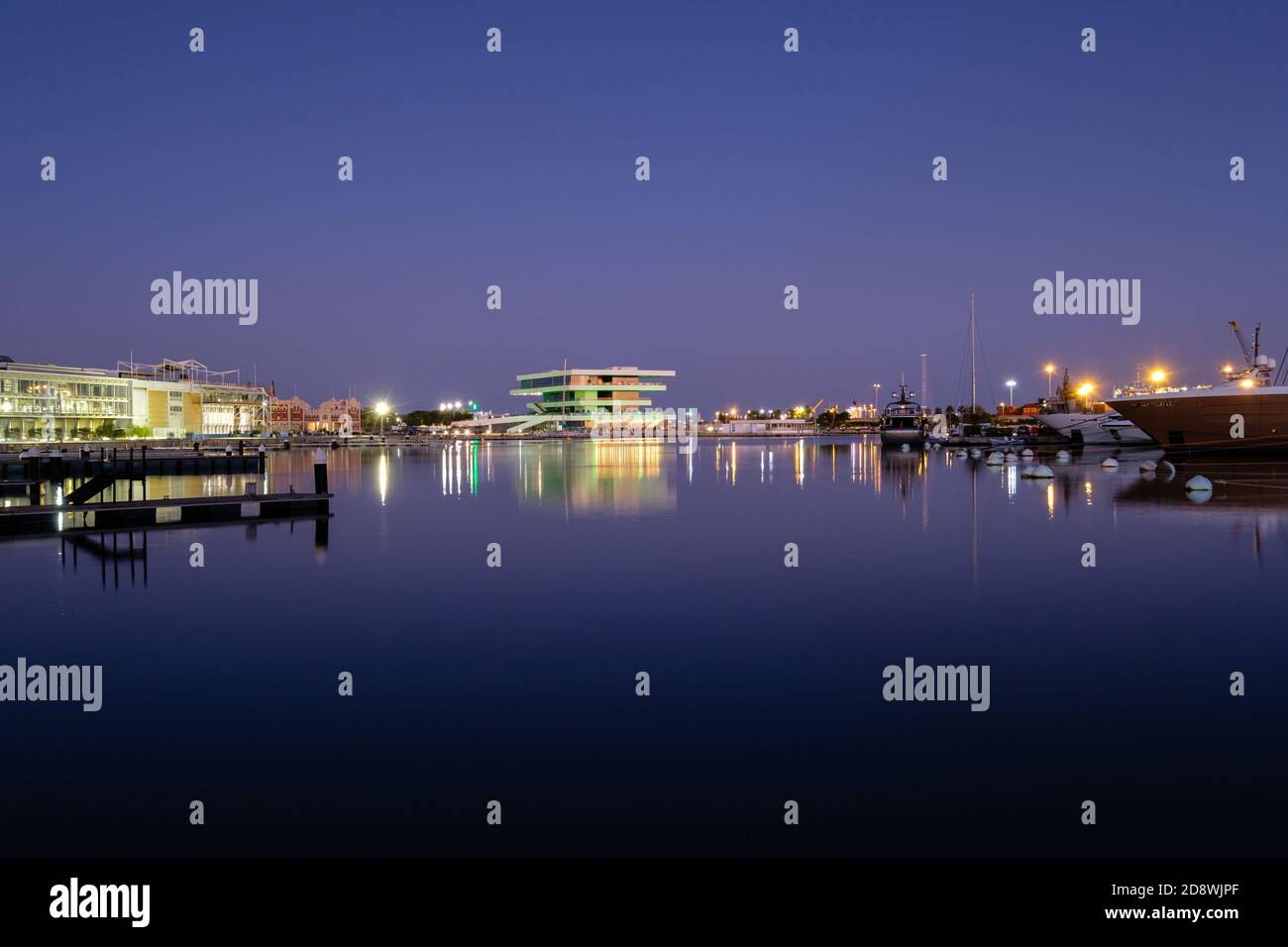Valencia harbor, port night lights reflection in water, modern ...