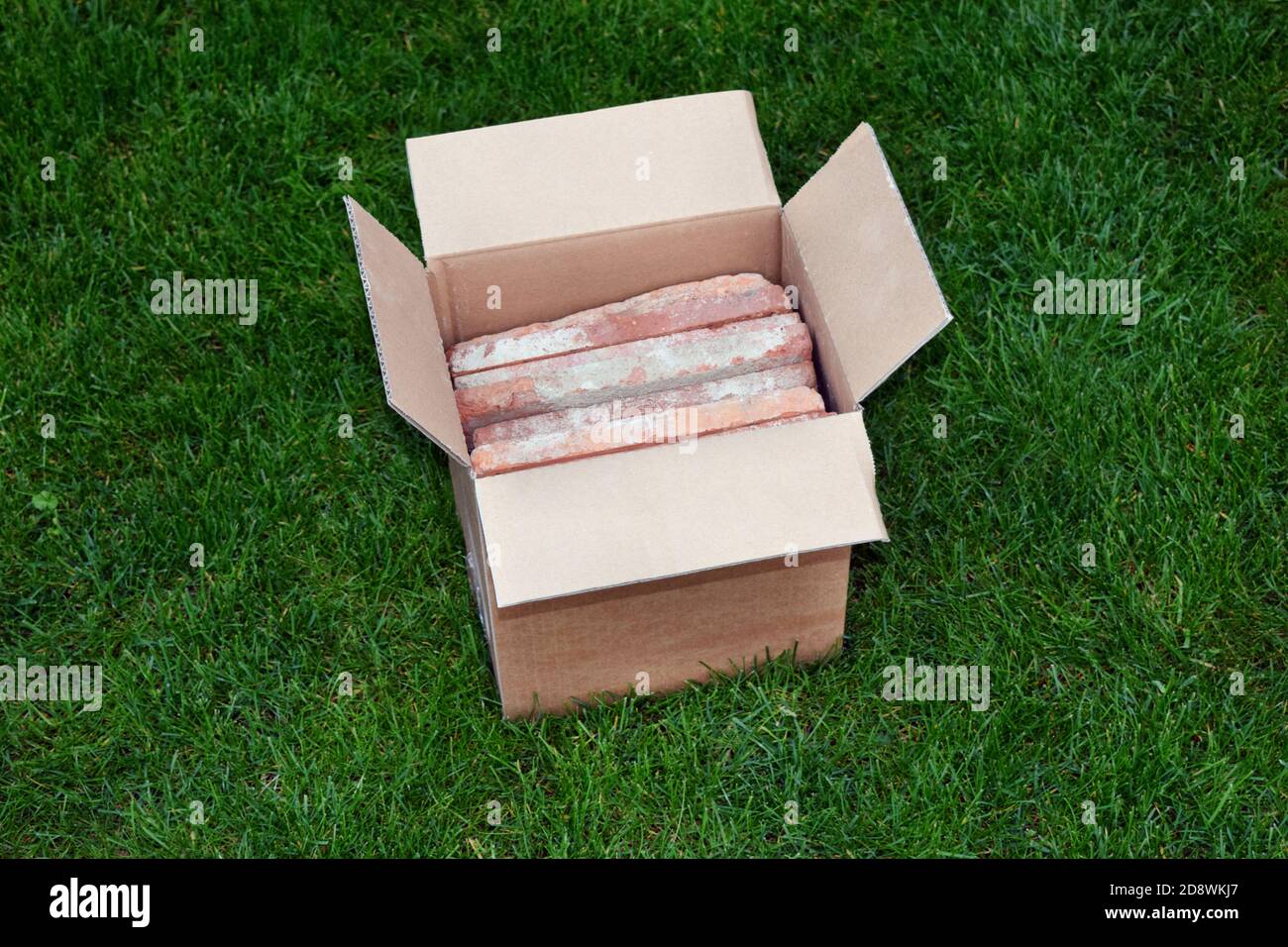 Red cardboard bricks hi-res stock photography and images - Alamy