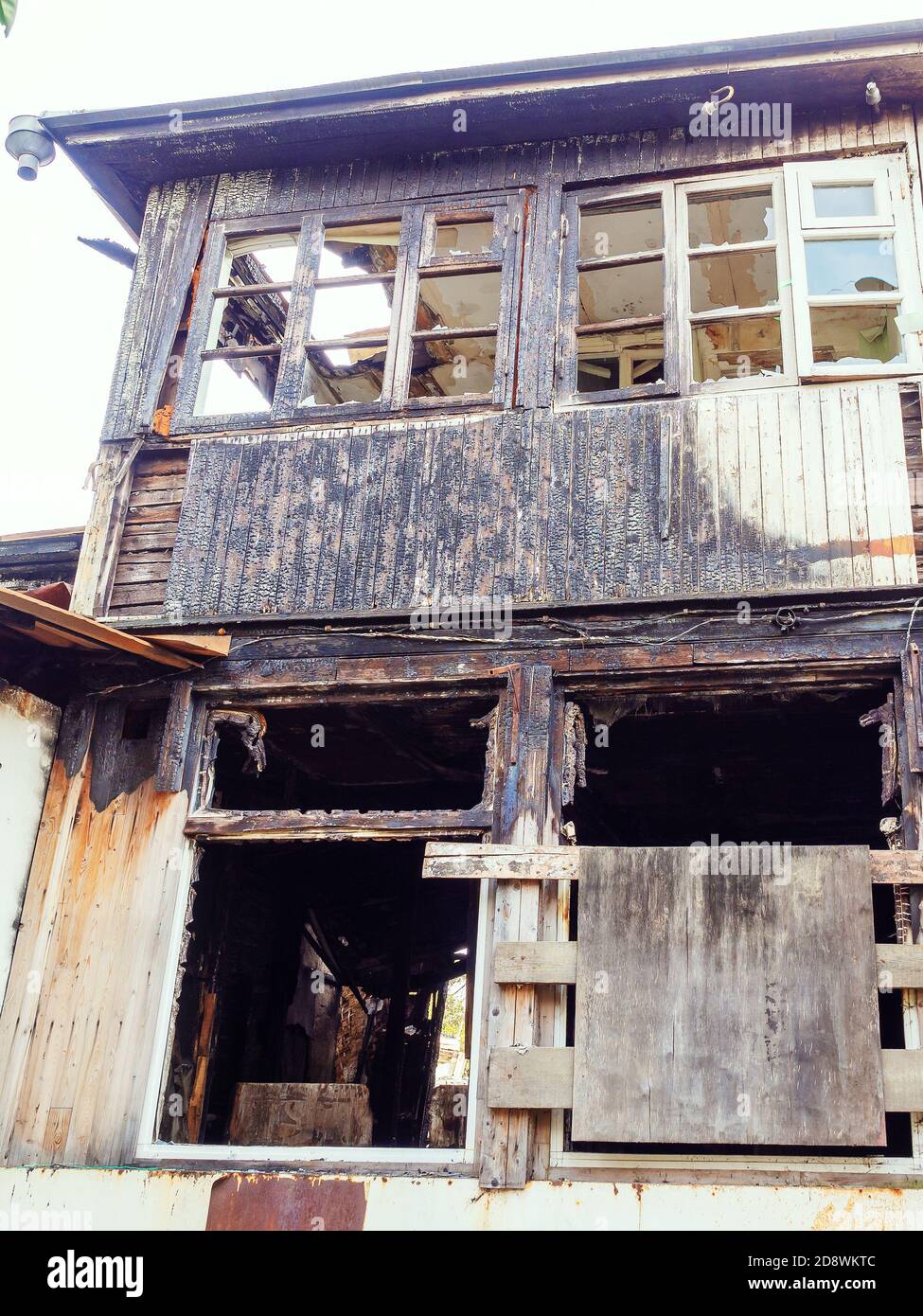 A fragment of an old burnt wooden house. Accident. Emergency Stock ...