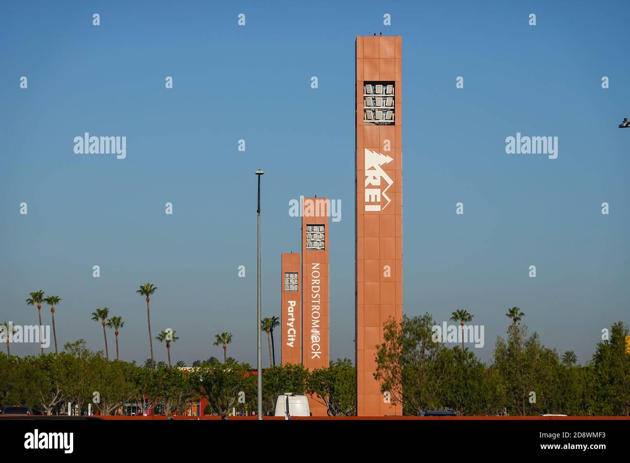 REI sign and logo in the parking lot of a store in Tustin California ...