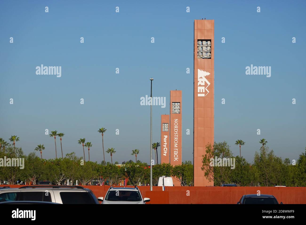 REI sign and logo in the parking lot of a store in Tustin California ...