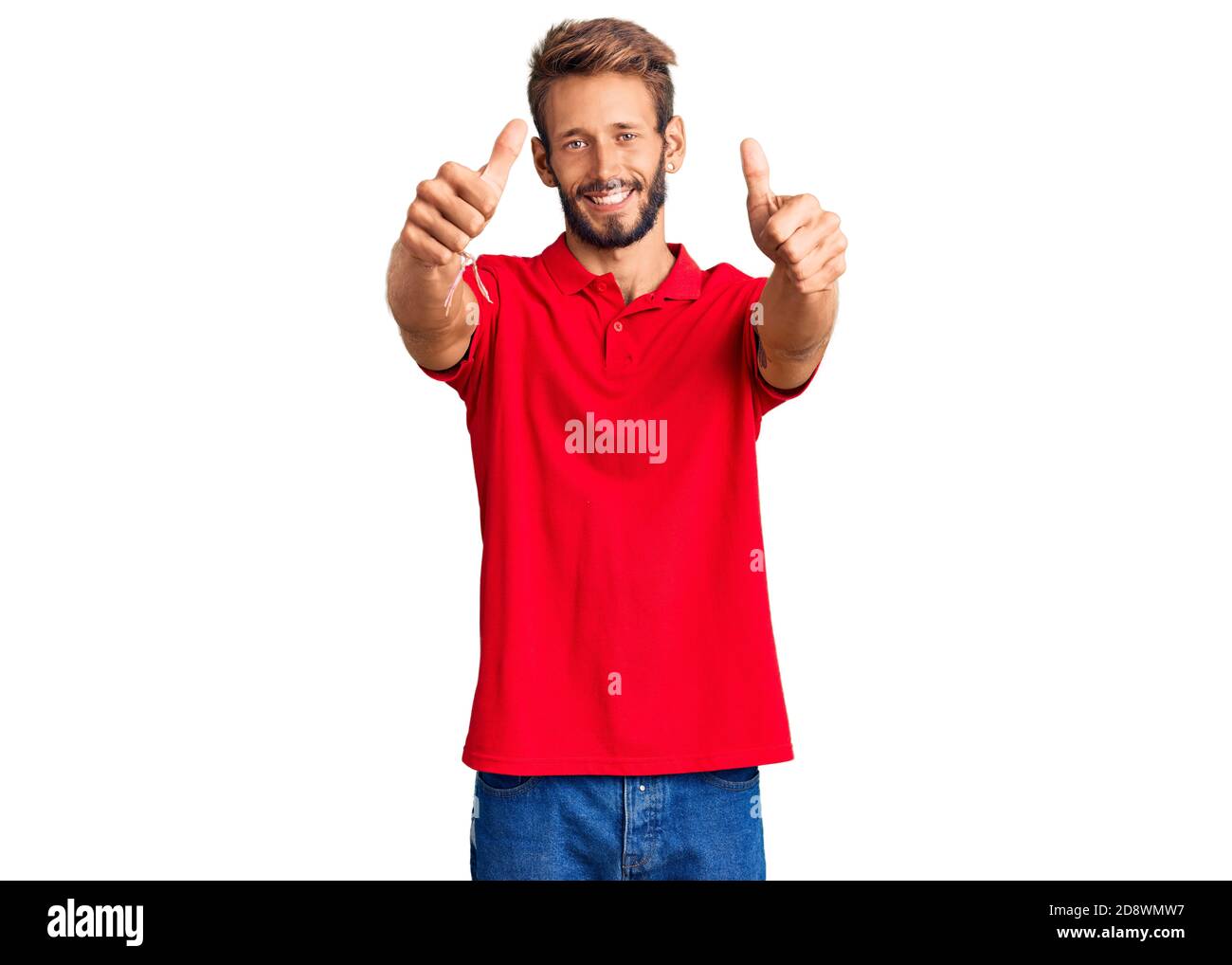 Handsome blond man with beard wearing casual clothes approving doing ...