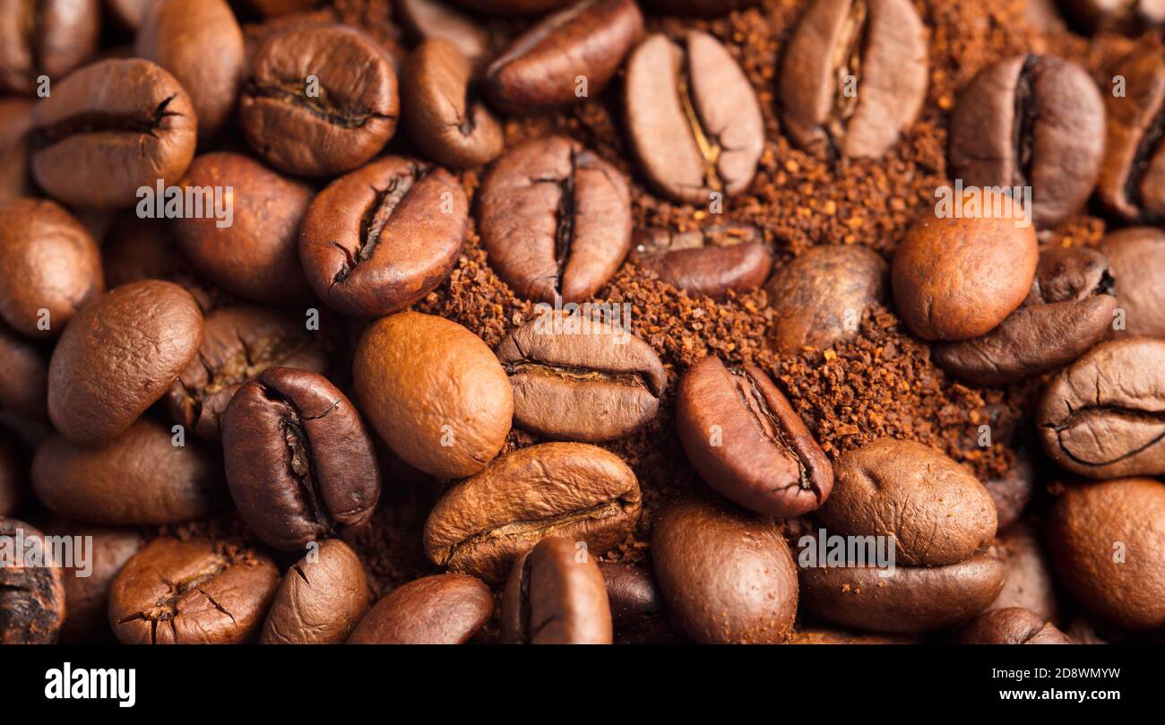 Coffee beans and coffee powder (ground coffee) brown background Stock ...