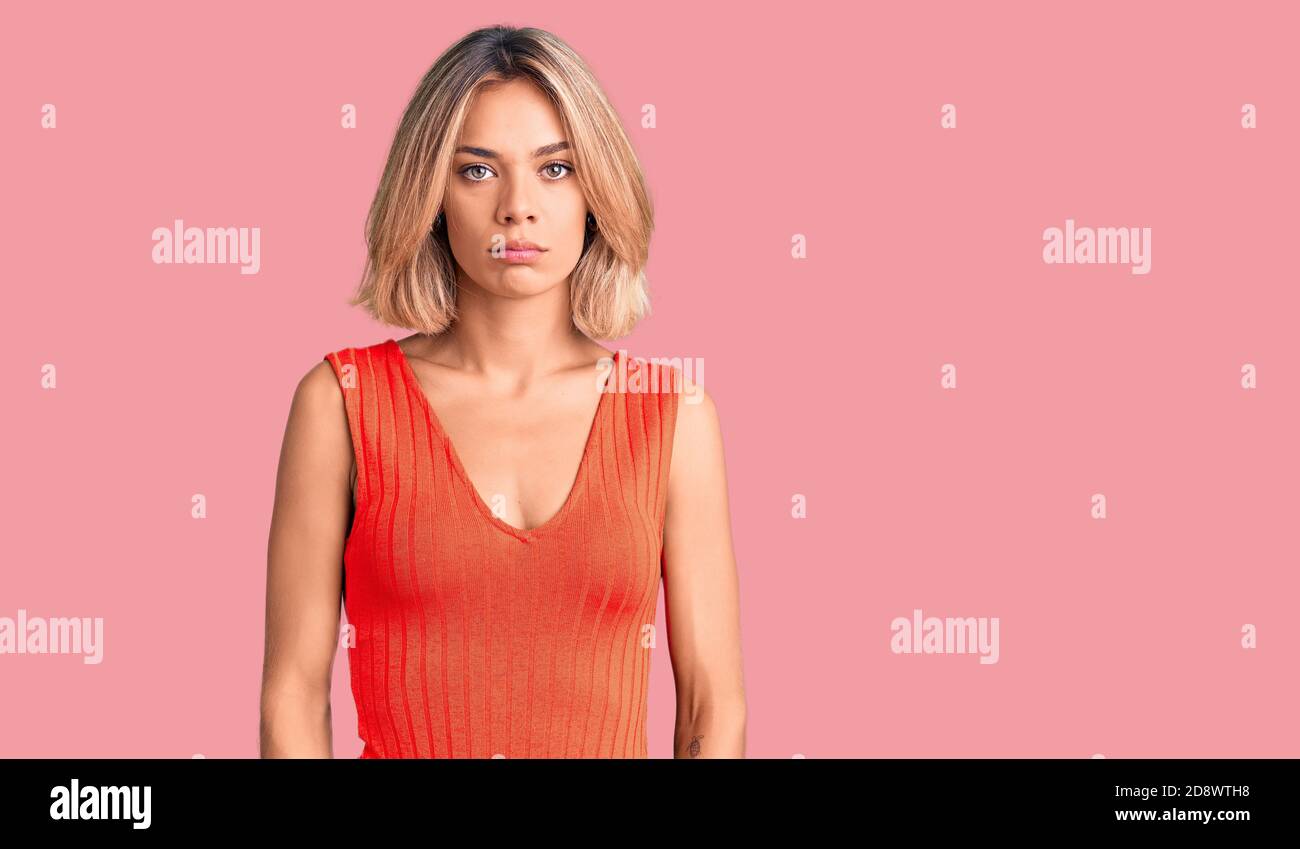 Beautiful caucasian woman wearing casual clothes depressed and worry ...