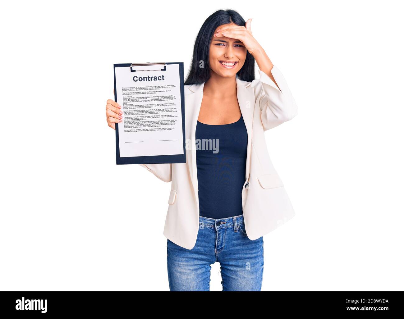 Young beautiful latin girl holding clipboard with contract document ...