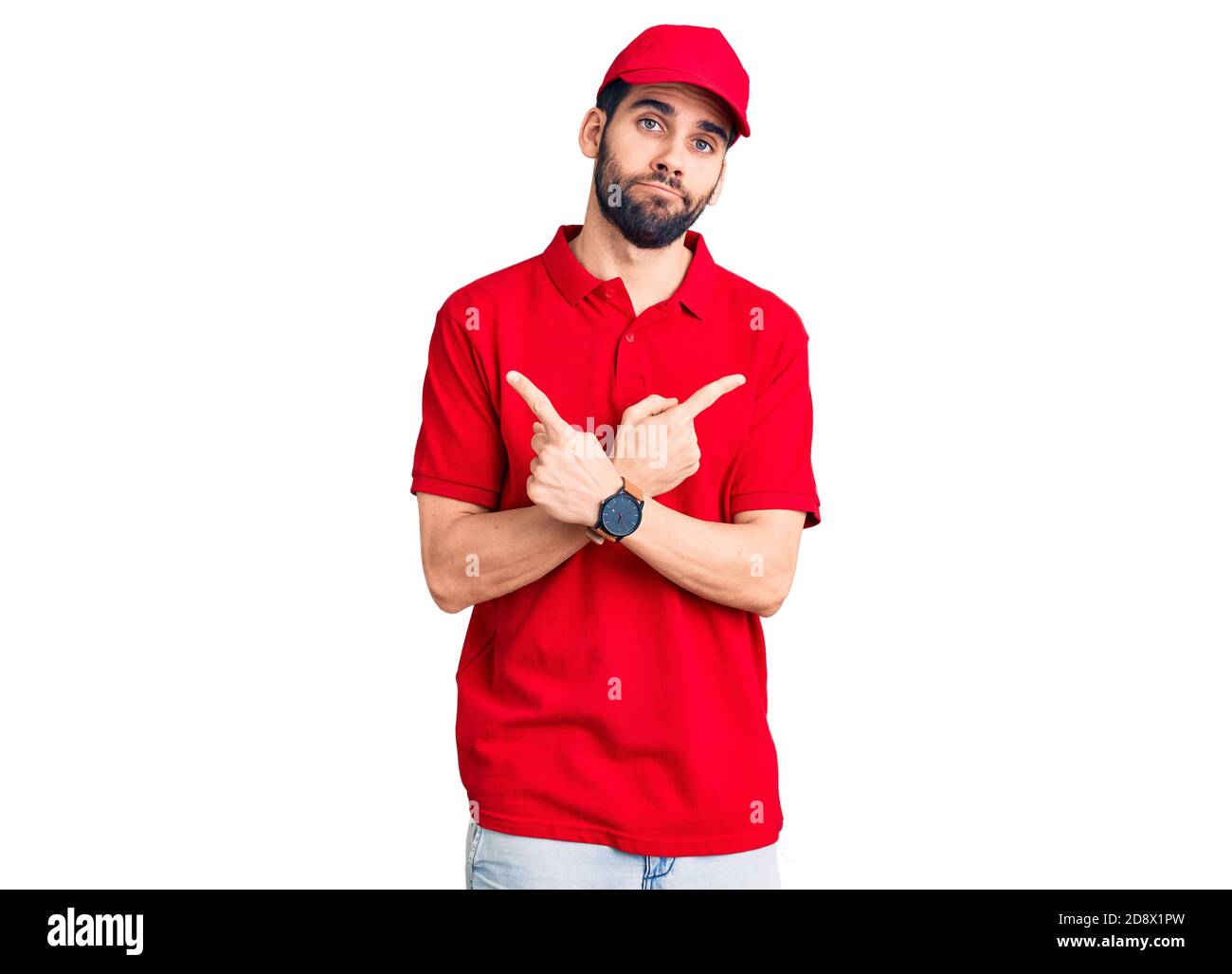 Young Handsome Man With Beard Wearing Delivery Uniform Pointing To Both