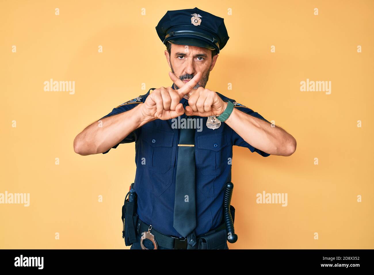 Middle age hispanic man wearing police uniform rejection expression ...