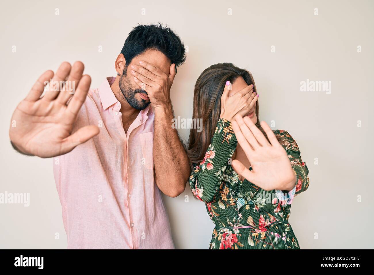 Beautiful young couple of boyfriend and girlfriend together covering ...