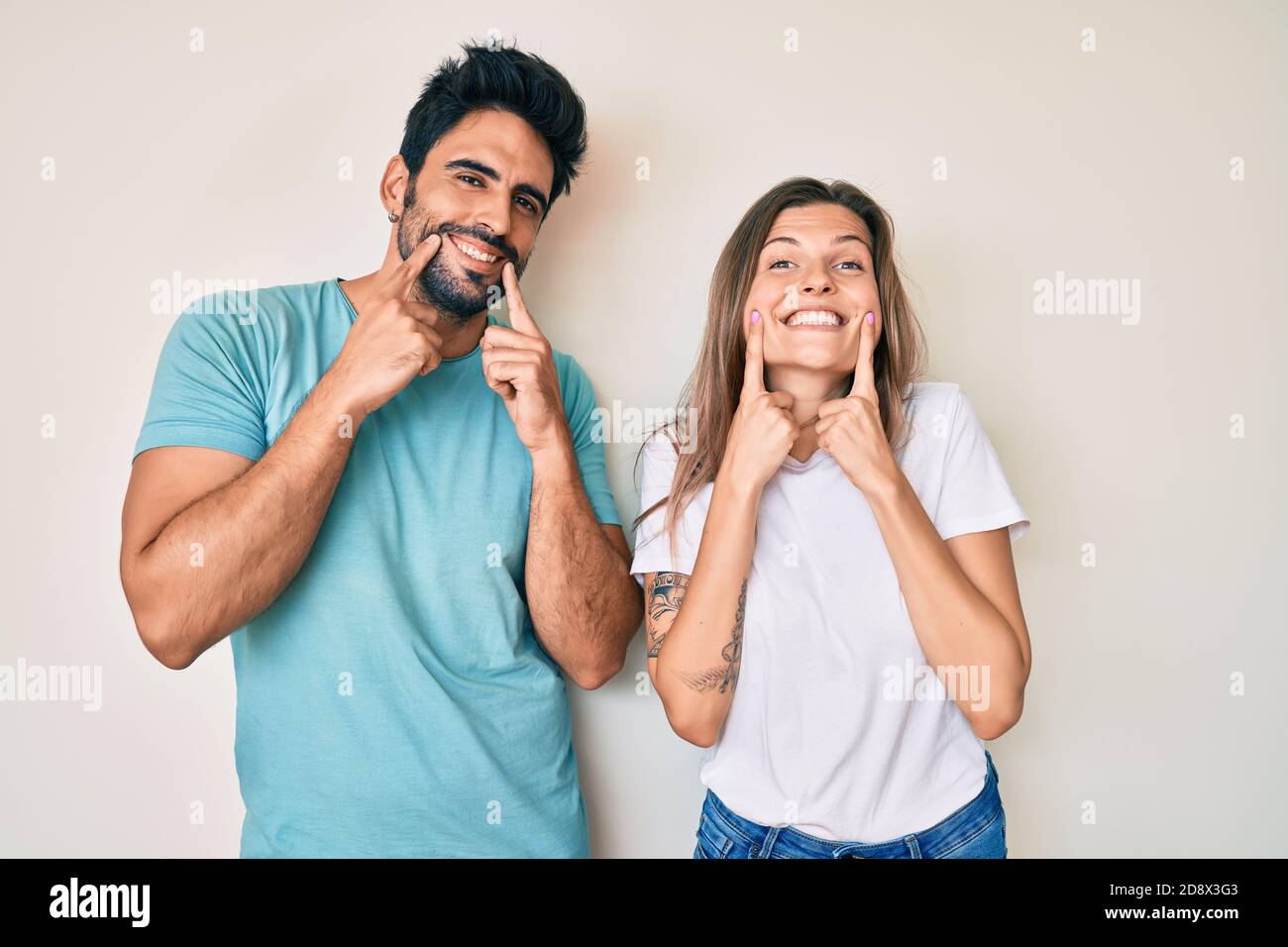 Beautiful young couple of boyfriend and girlfriend together smiling ...