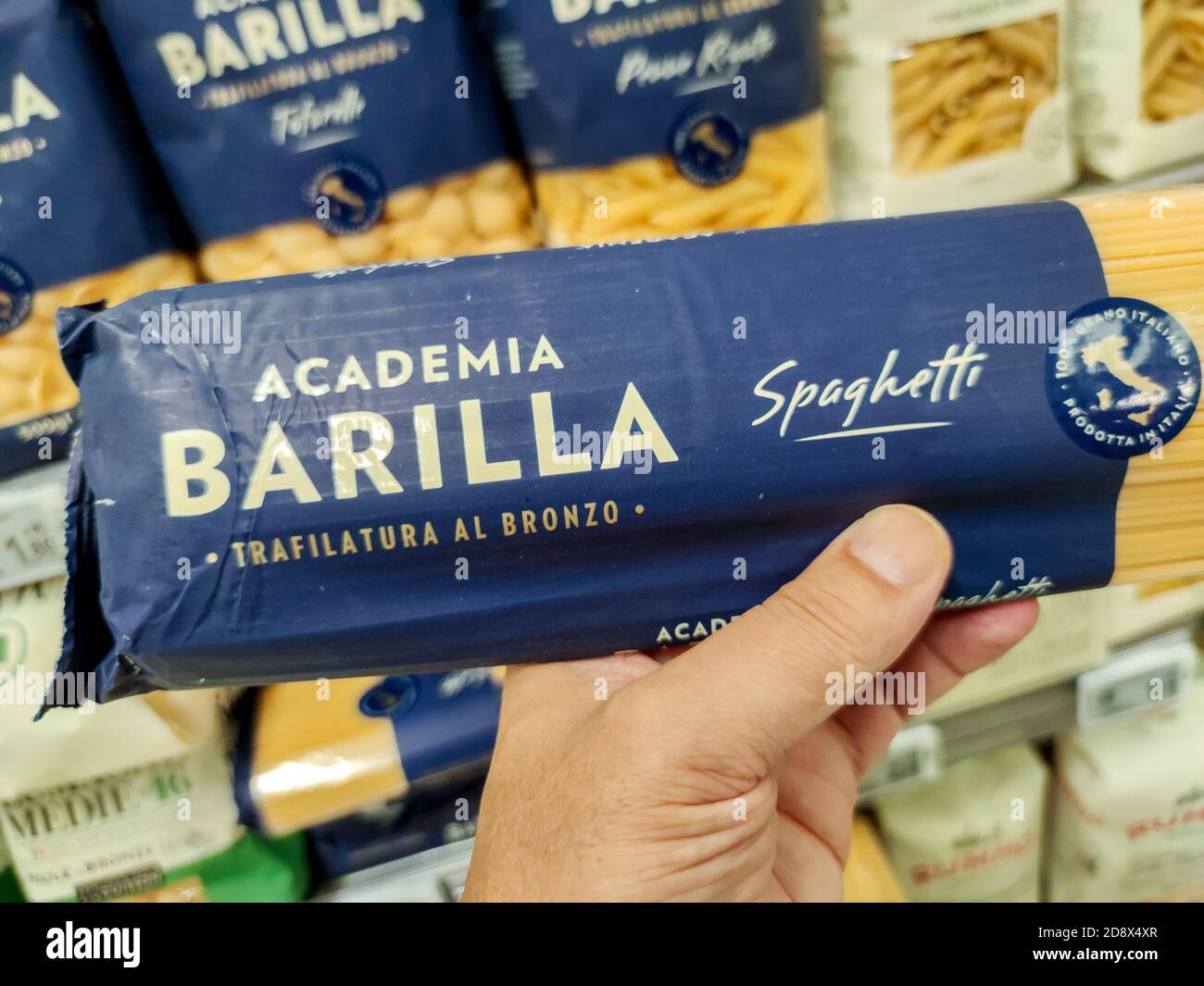 Puilboreau, France - October 14, 2020: Closeup of Man hand buying a ...