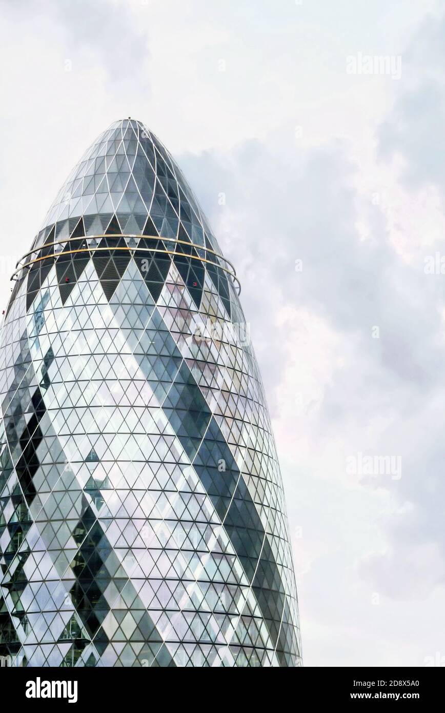 Exterior of The Gherkin, 30 St Mary Axe building with blue sky in ...