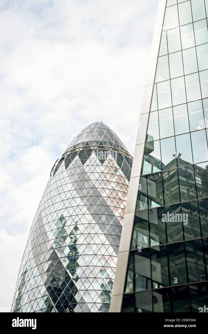 Exterior of The Gherkin, 30 St Mary Axe building with blue sky in ...