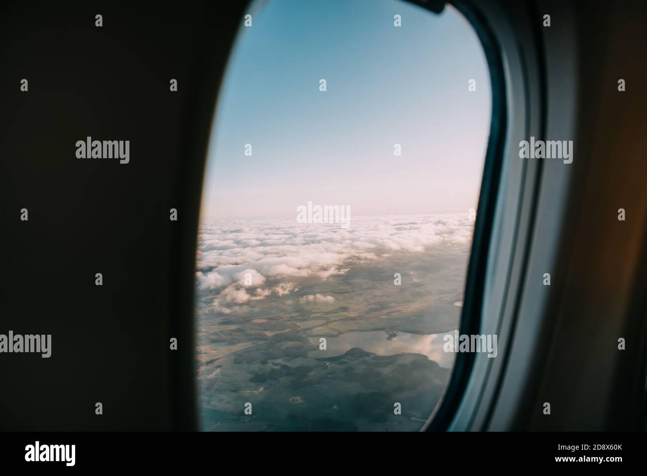Airplane interior with window view of the Baltic sea and clouds Stock ...