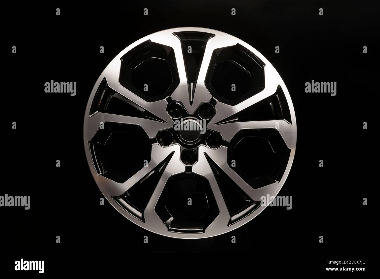 shiny alloy wheels new design in the shape of a star, front view, on a ...