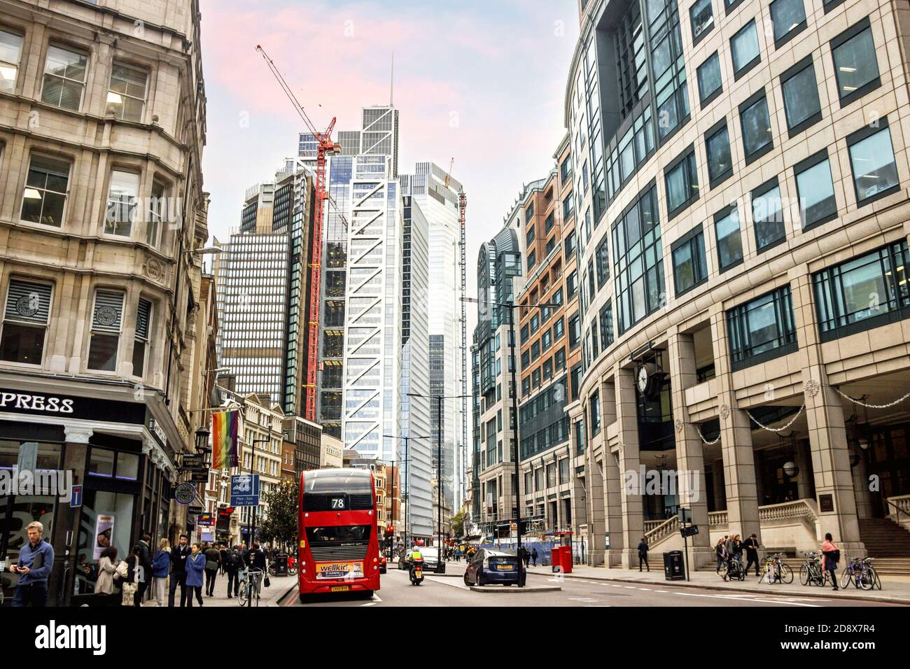 Street view of modern buildings with busy traffic at city of London ...