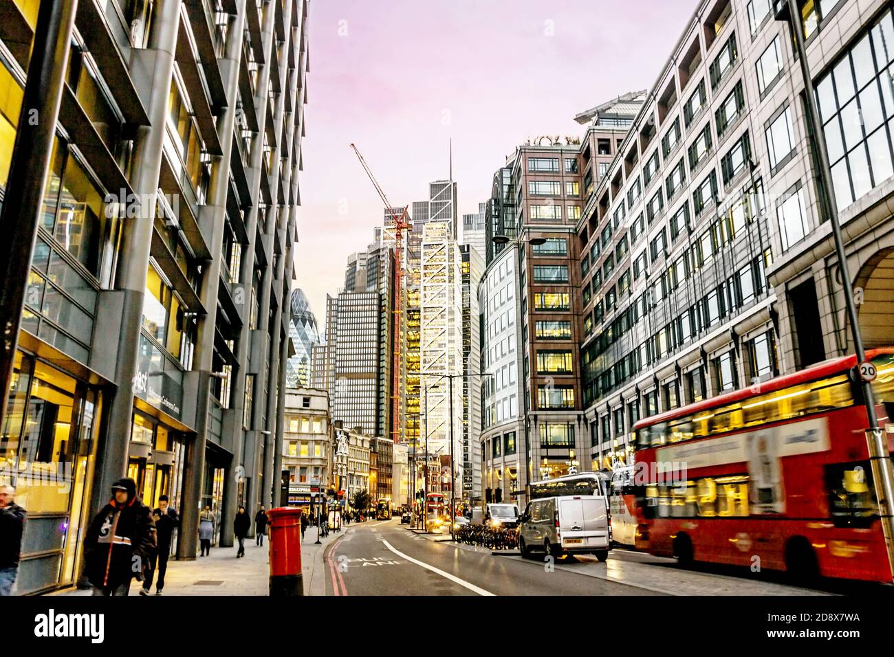 Street view of modern buildings with busy traffic at city of London ...
