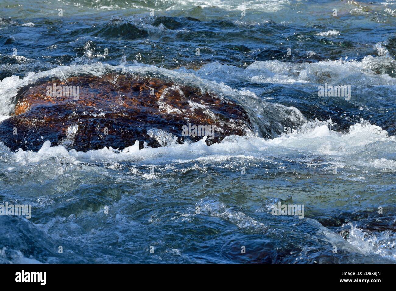 Water flowing into a rock hi-res stock photography and images - Alamy