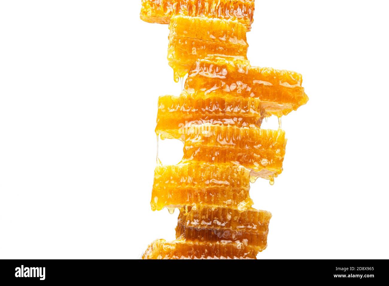 Pyramid of fresh bee comb honey on white background Stock Photo - Alamy