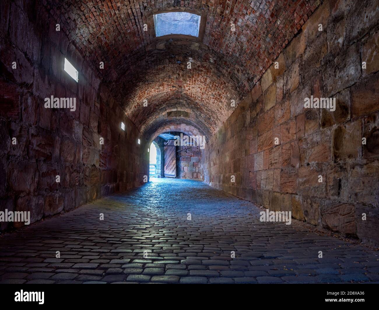 Underground passage under old medieval fortress Stock Photo - Alamy
