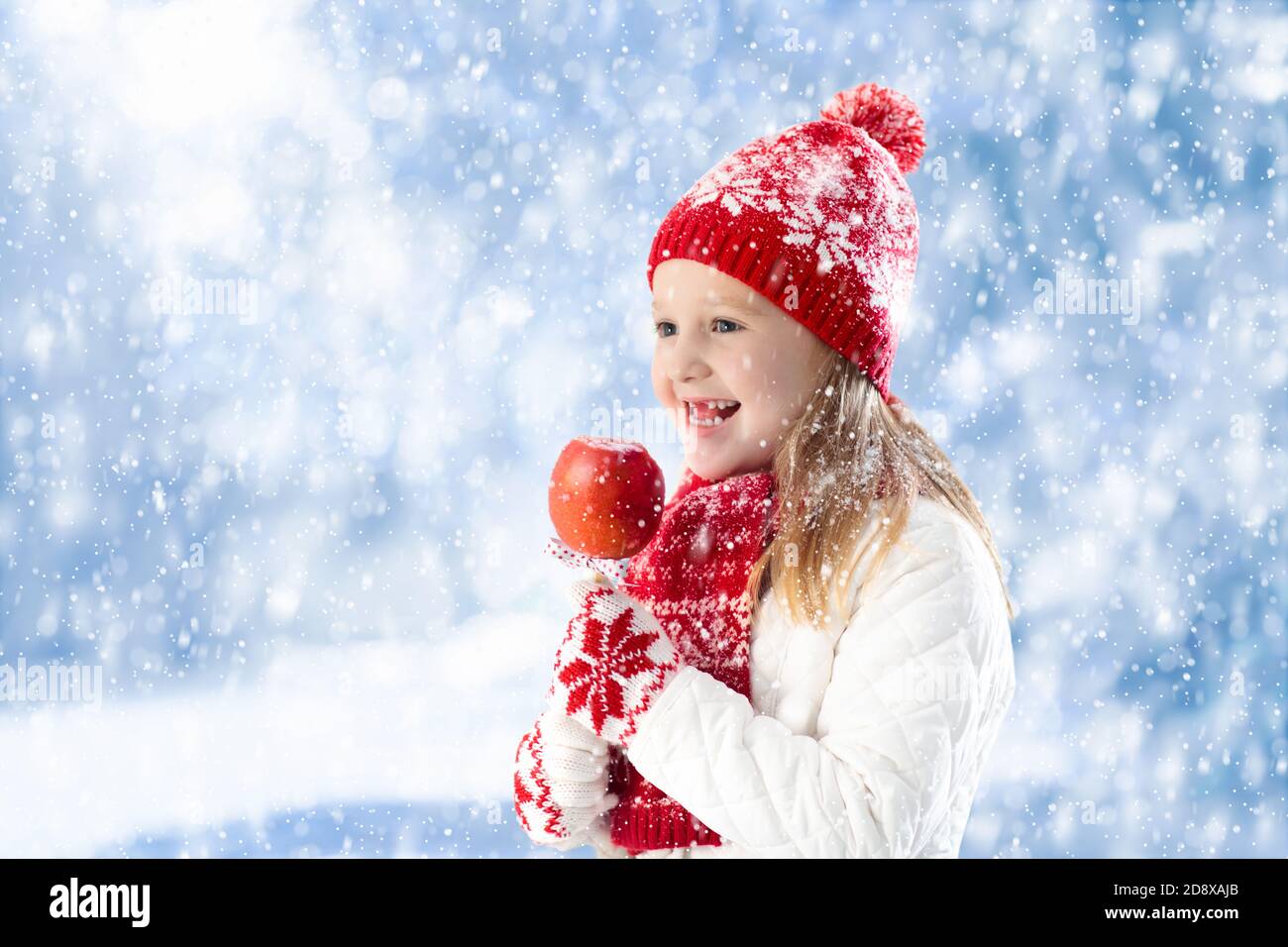 Girl eating caramel apple hi-res stock photography and images - Alamy