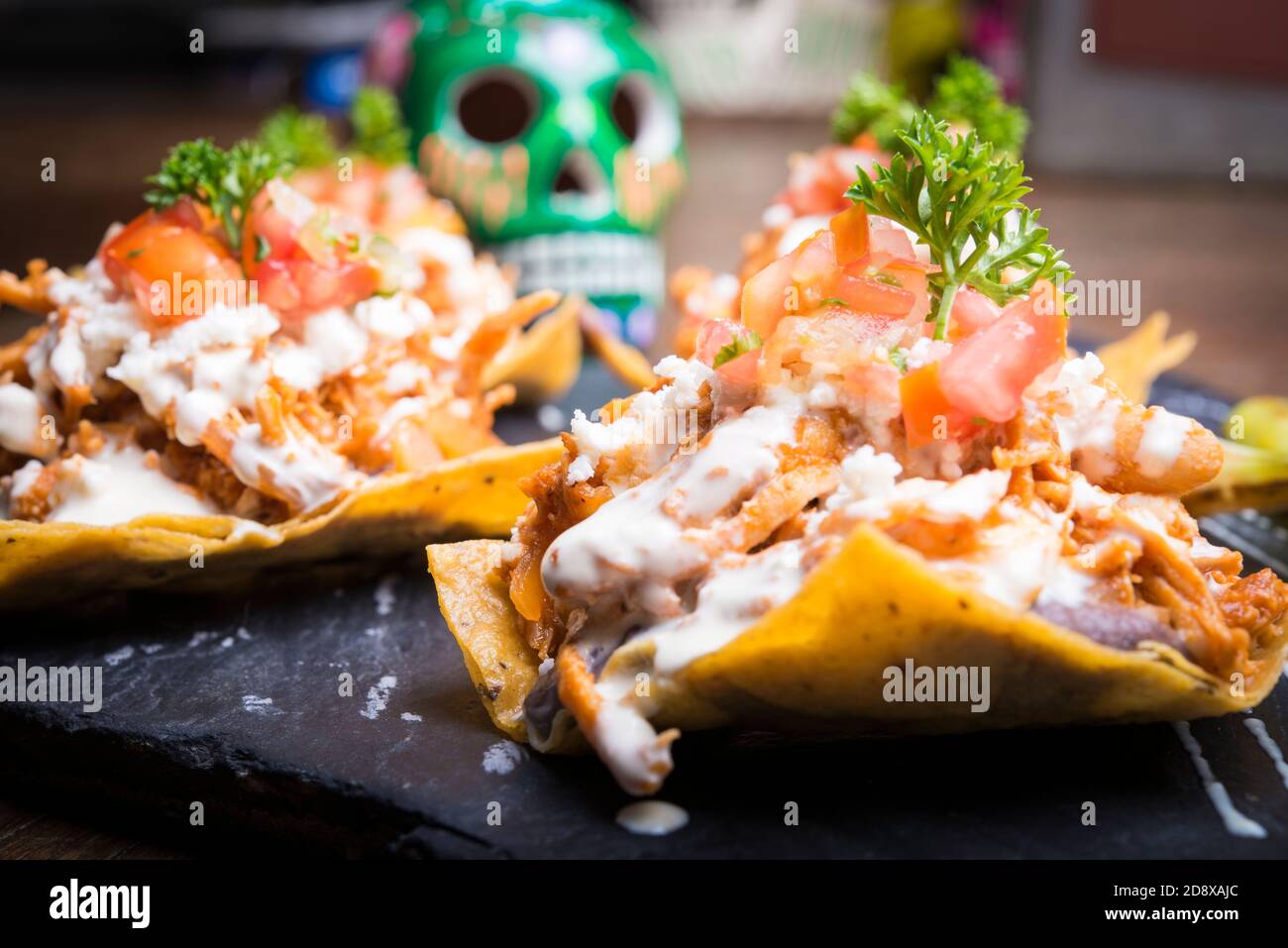 Mexican tostadas tacos with hard shell tortilla with pulled pork sour ...
