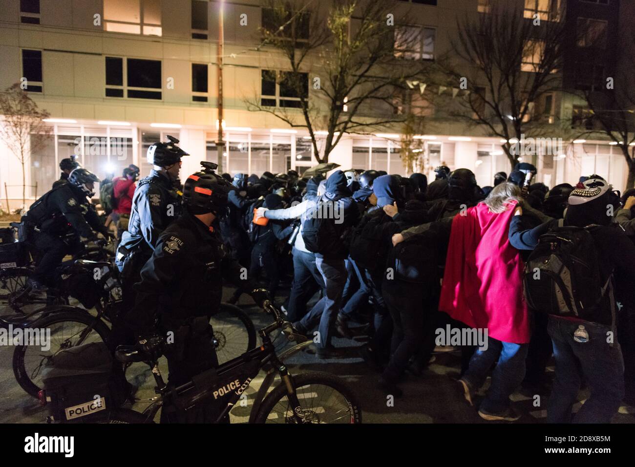 Seattle, USA. 31st Oct, 2020. Police pushing protestors at the ...