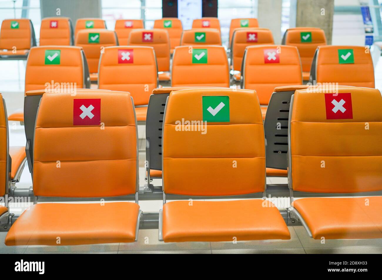 Row of empty bench chair seats in public transportation terminal with ...