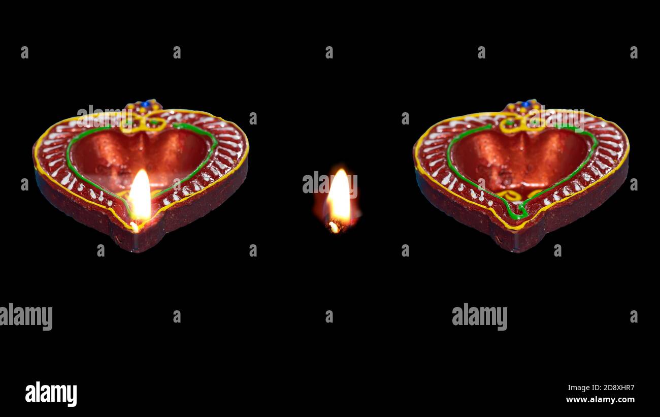 Diya lamp with fire. Traditional Divali festival Stock Photo - Alamy
