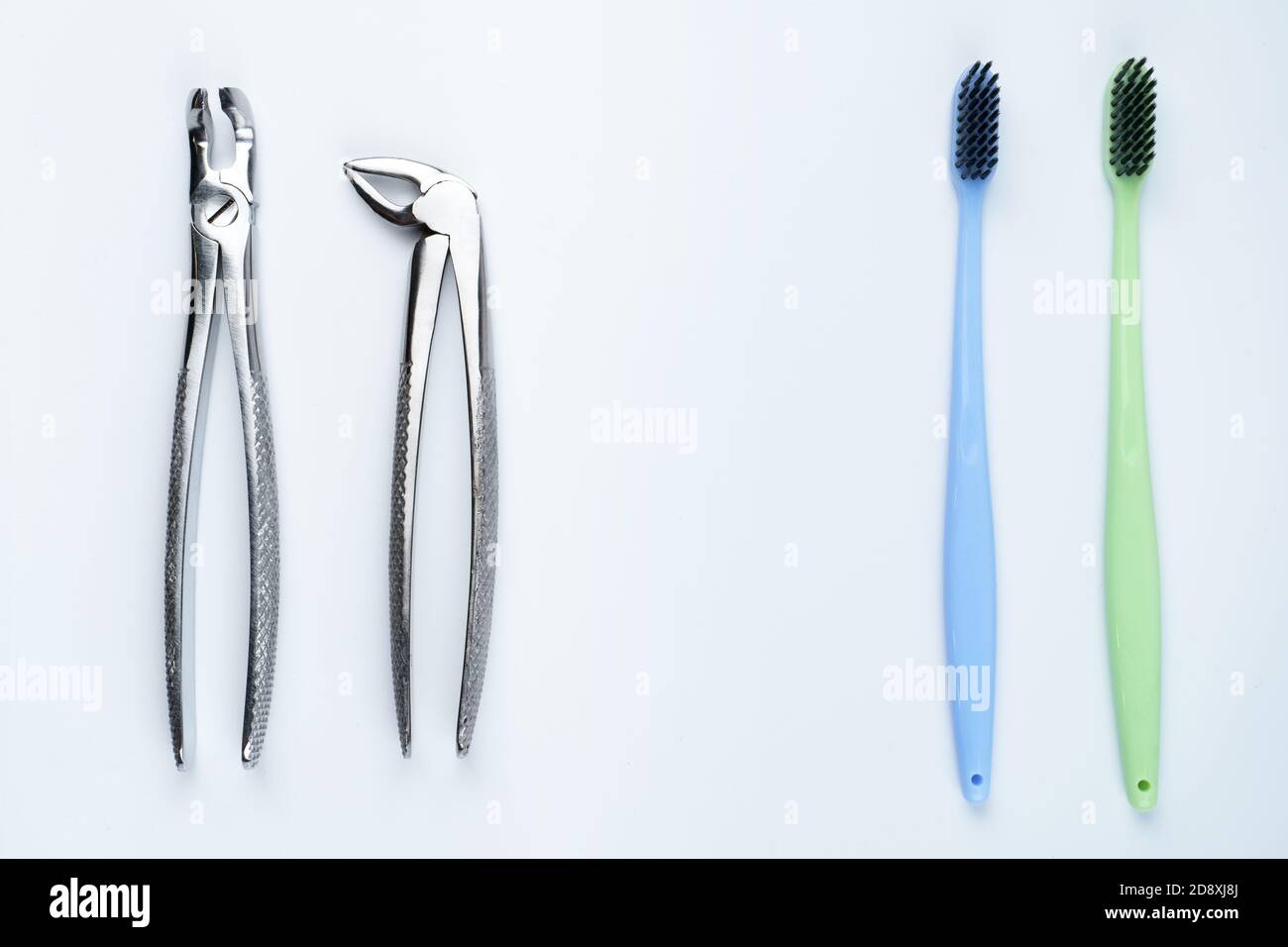 Image of two dental tools with tooth on isolated white background Stock ...