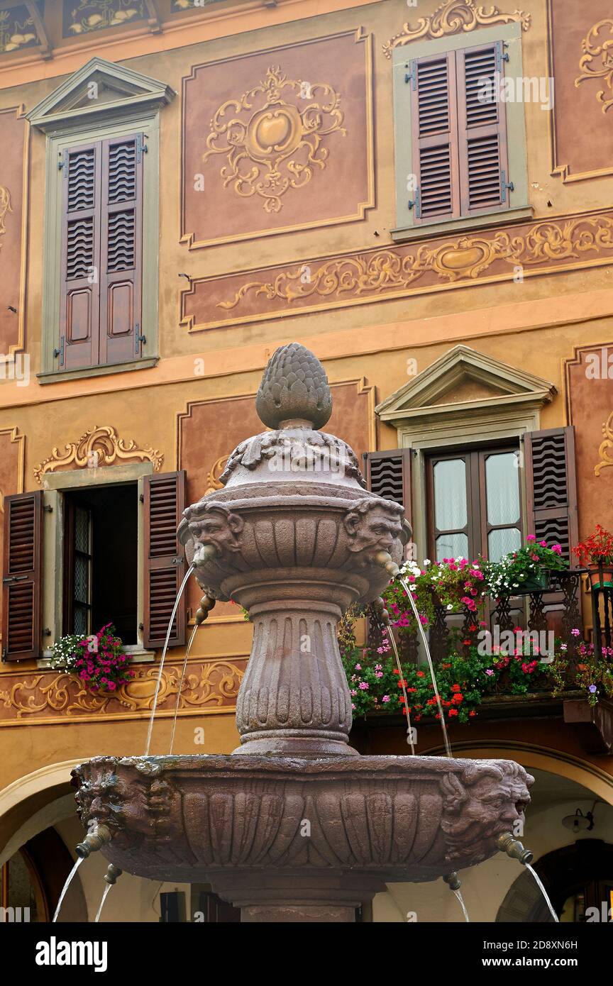 Borno (Bs), Valcamonica, Italy,a detail of a fountain and a building of ...