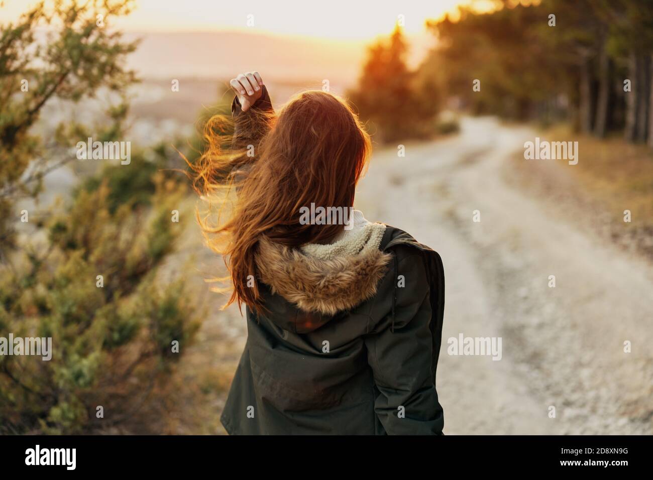 Lady walk back on field hi-res stock photography and images - Alamy