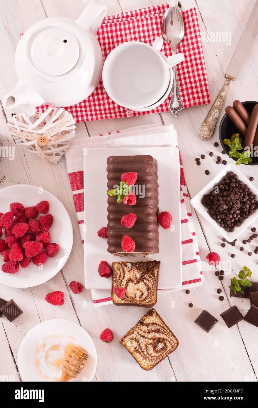 Marble cake with raspberries Stock Photo - Alamy