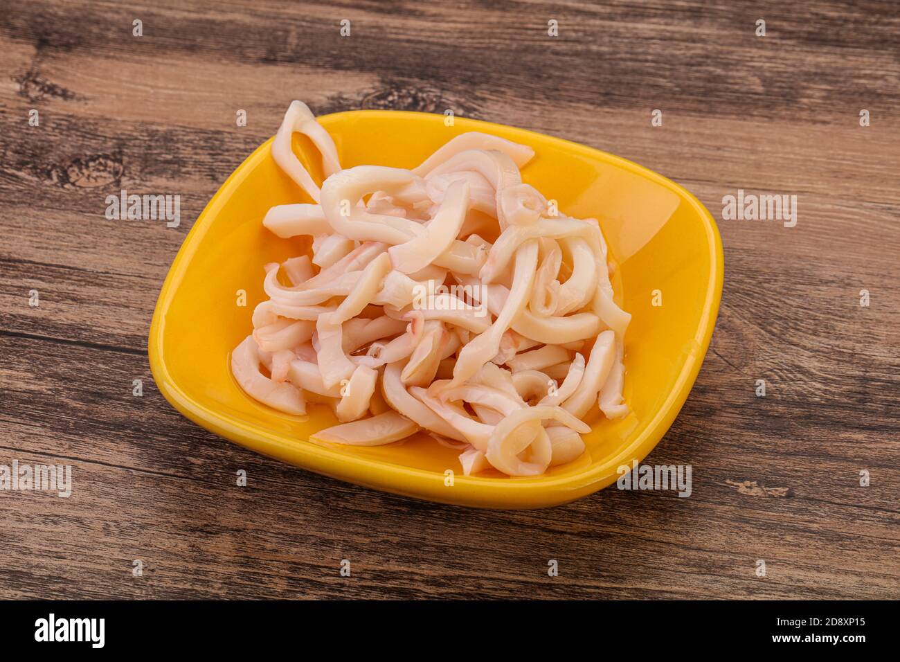 Tasty Marinated squid slices snack in the bowl Stock Photo - Alamy