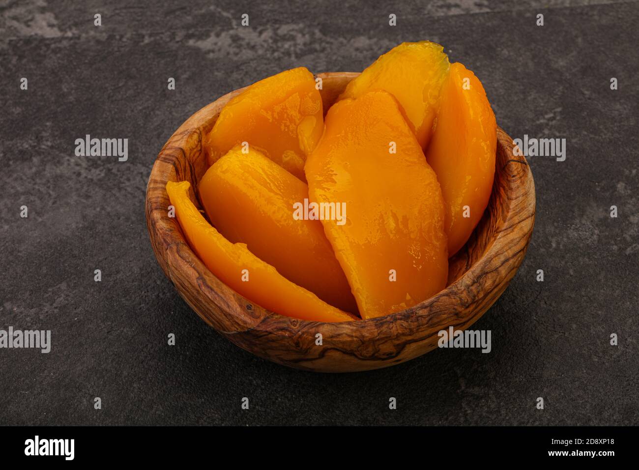 Sweet delicous mango slices in syrop Stock Photo - Alamy