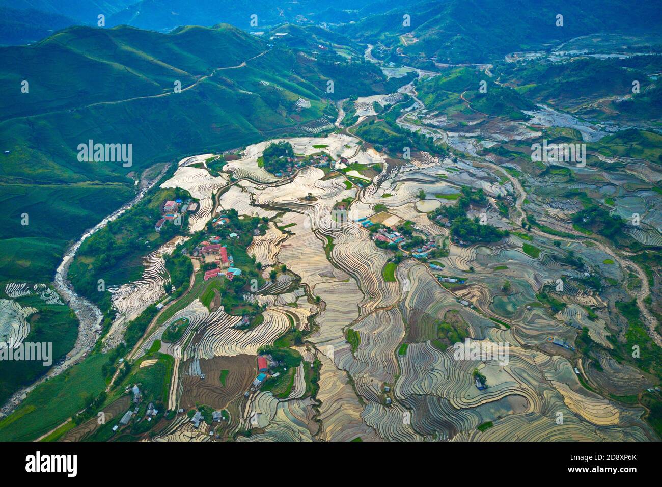 Aerial view of rice terraces in mountainous region of Y Ty, Vietnam ...