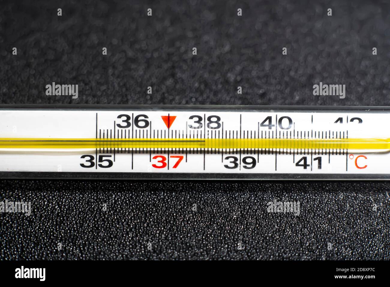 Mercury thermometer on black background. Close up photo. Thermometer ...