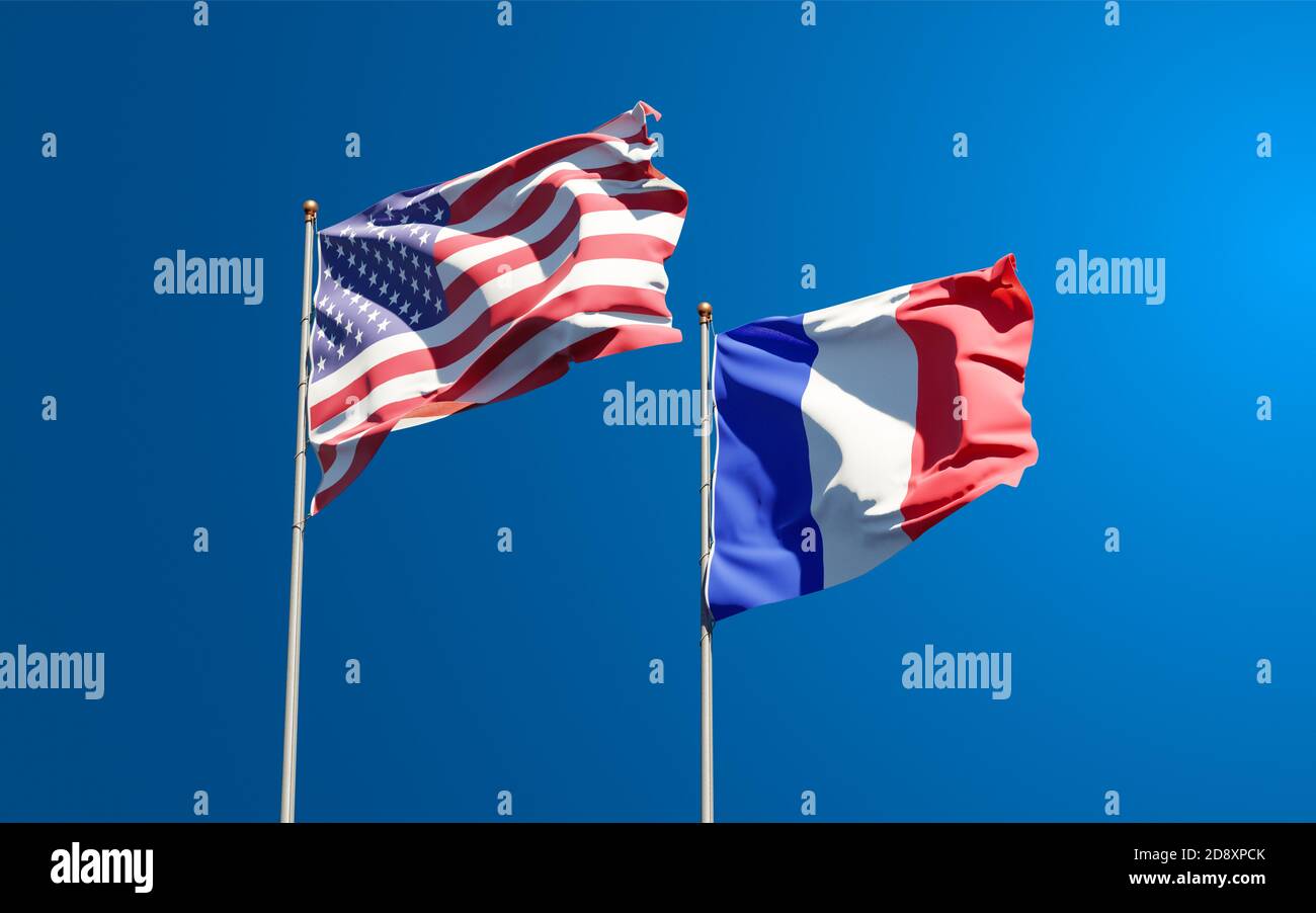 Beautiful national state flags of France and USA together at the sky ...