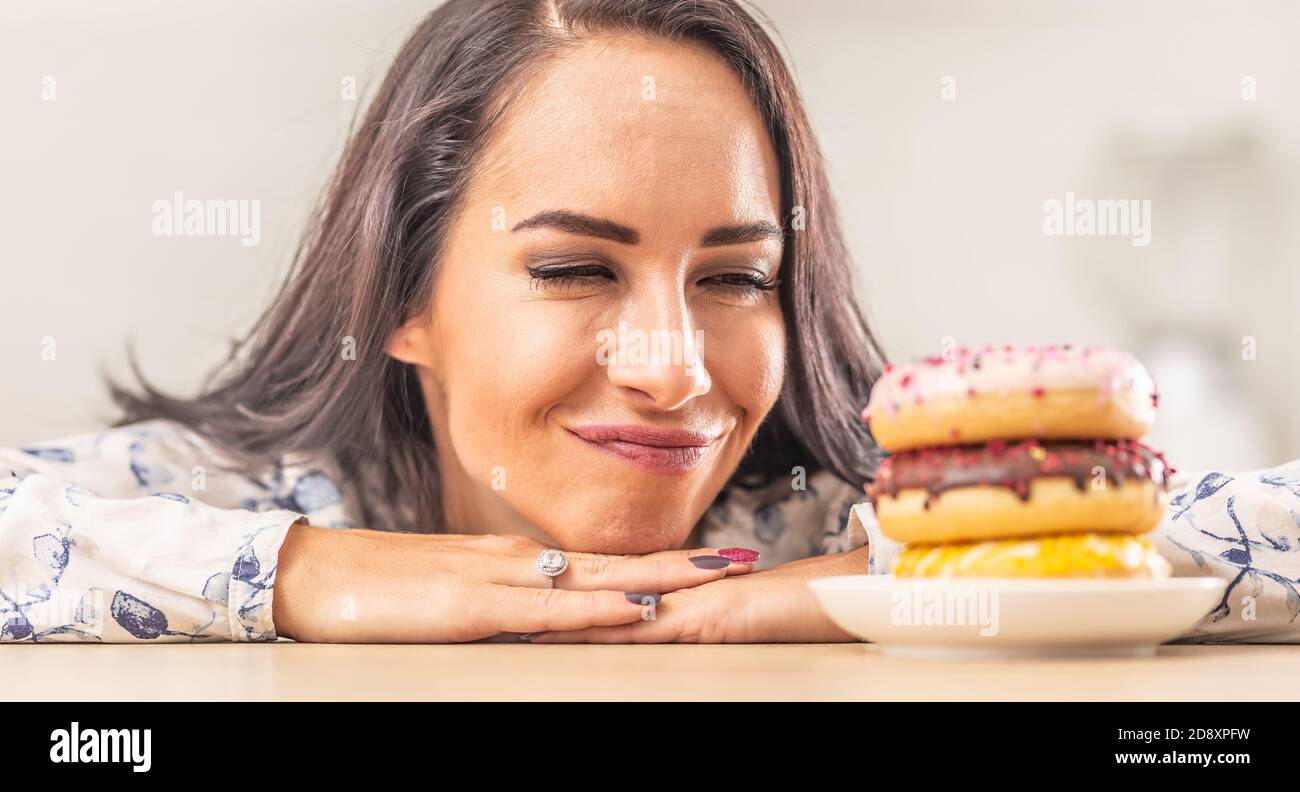 Woman guilty eating hi-res stock photography and images - Alamy