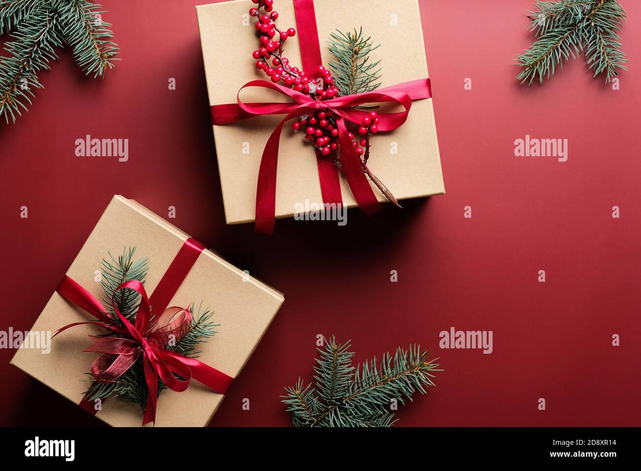 Christmas gift boxes wrapped kraft paper decorated ribbon bow and fir ...