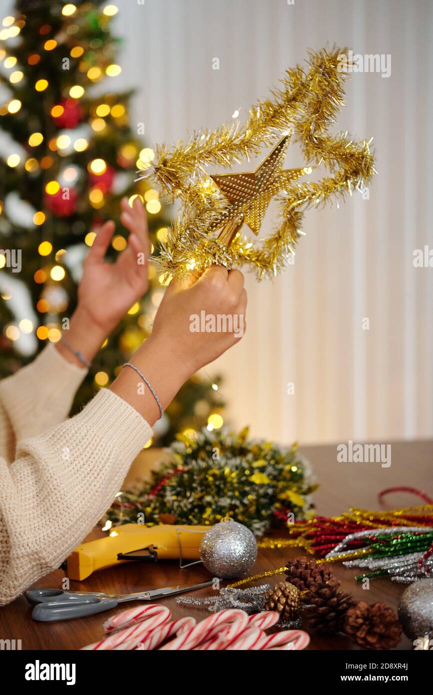 Decorating Christmas star Stock Photo - Alamy