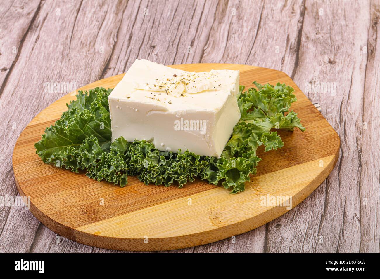 Traditional tasty Greek Feta soft cheese brick Stock Photo - Alamy