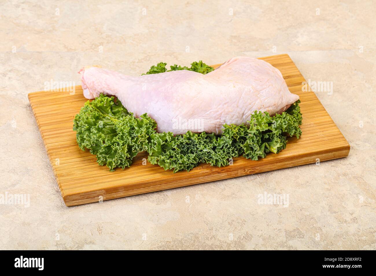 Raw uncooked chicken leg for cooking Stock Photo - Alamy