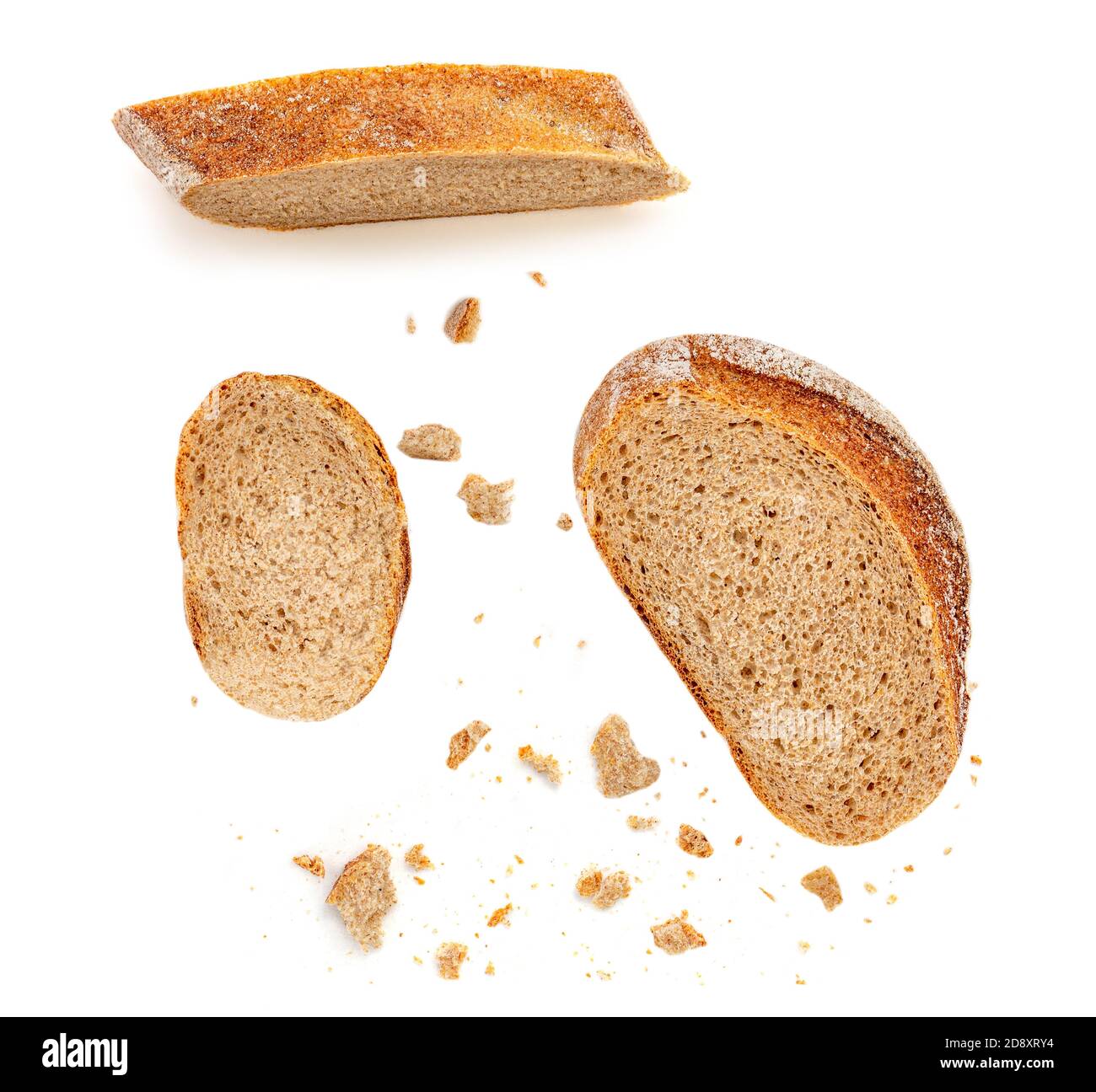 Bread slices and crumbs isolated on a white background. Bread viewed ...