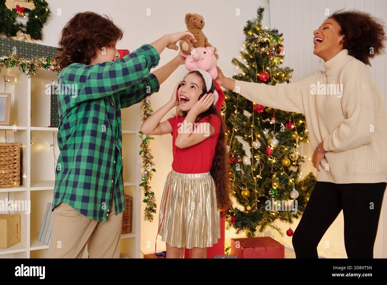 Kids having fun at Christmas party Stock Photo - Alamy