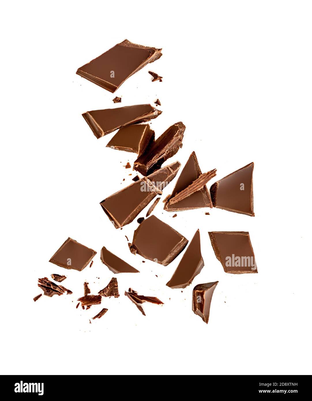 Falling Chocolate pieces and shavings isolated on white background ...