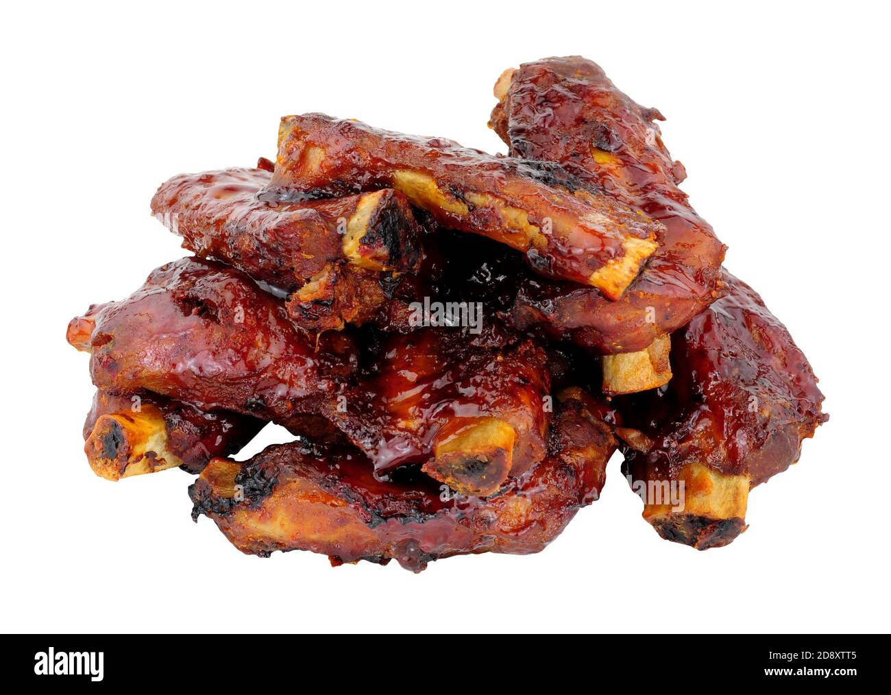 Group of mini pork ribs coated in sticky barbecue sauce isolated on a ...