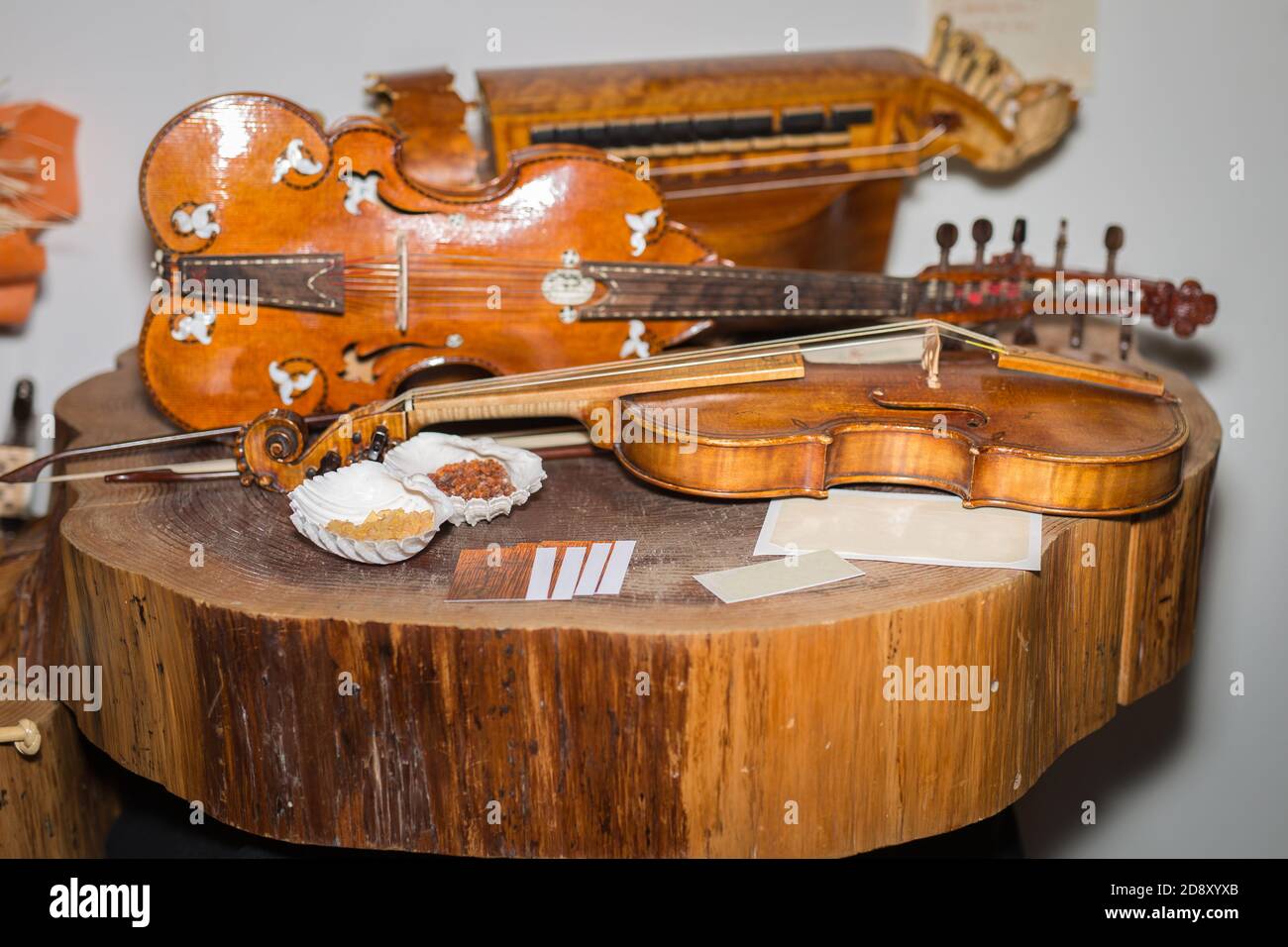 Baroque Wooden Violin on a Tree Trunk near other Instruments Stock ...
