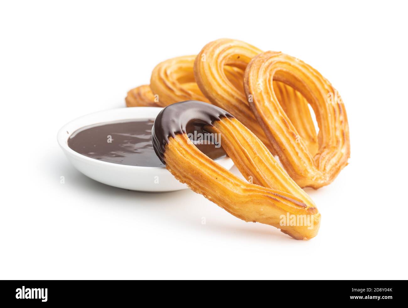 Tasty fried churros with chocolate dip isolated on white background ...