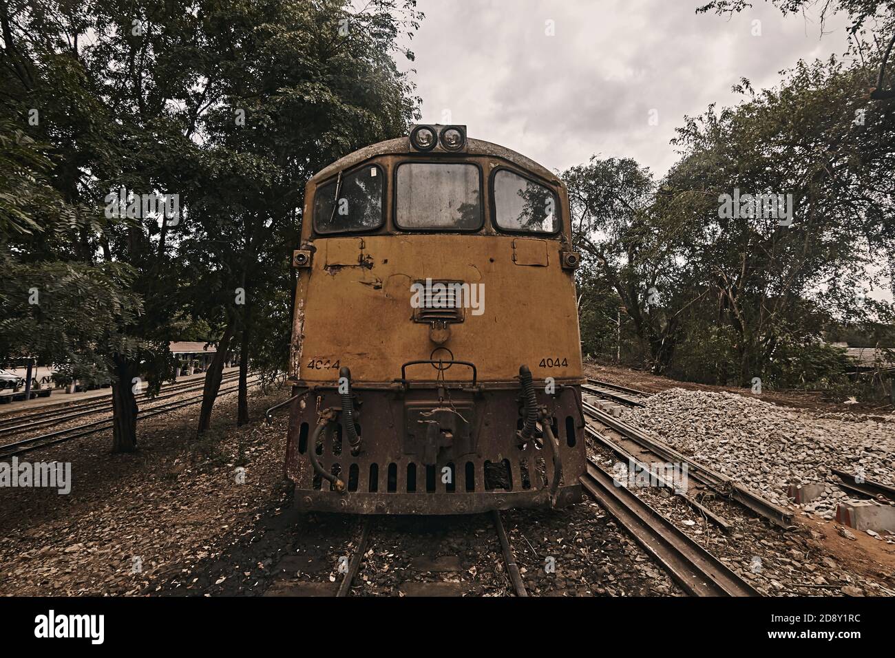 Old yellow diesel locomotive train at public station Stock Photo - Alamy