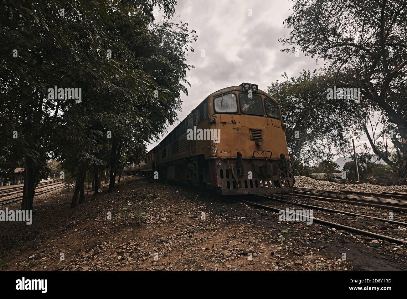 Old yellow diesel locomotive train at public station Stock Photo - Alamy